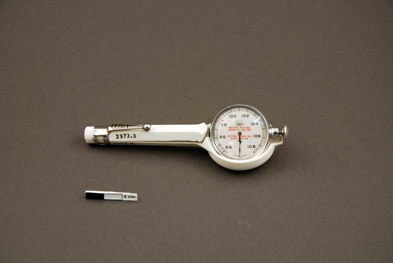 Rectal thermometer with dial gauge scaled 94-108° f, in casing ...