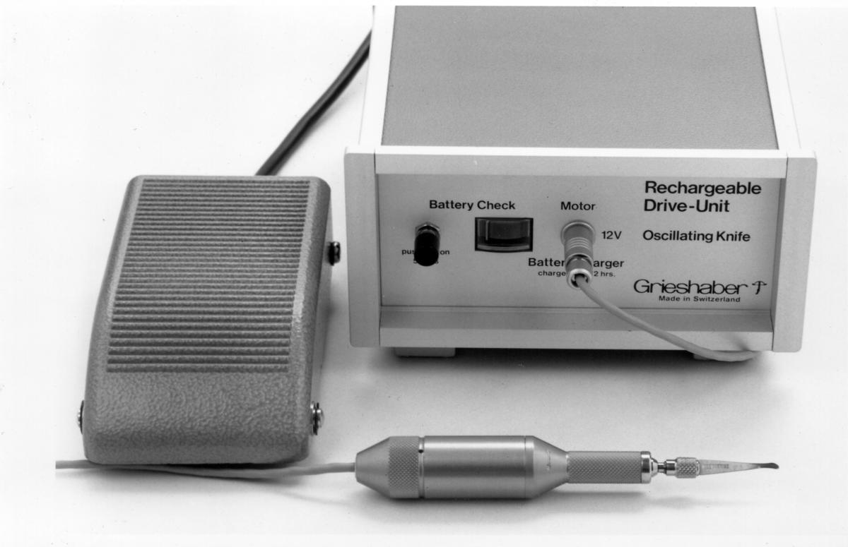 Black and white photograph of oscillating knife system - Faculty of ...